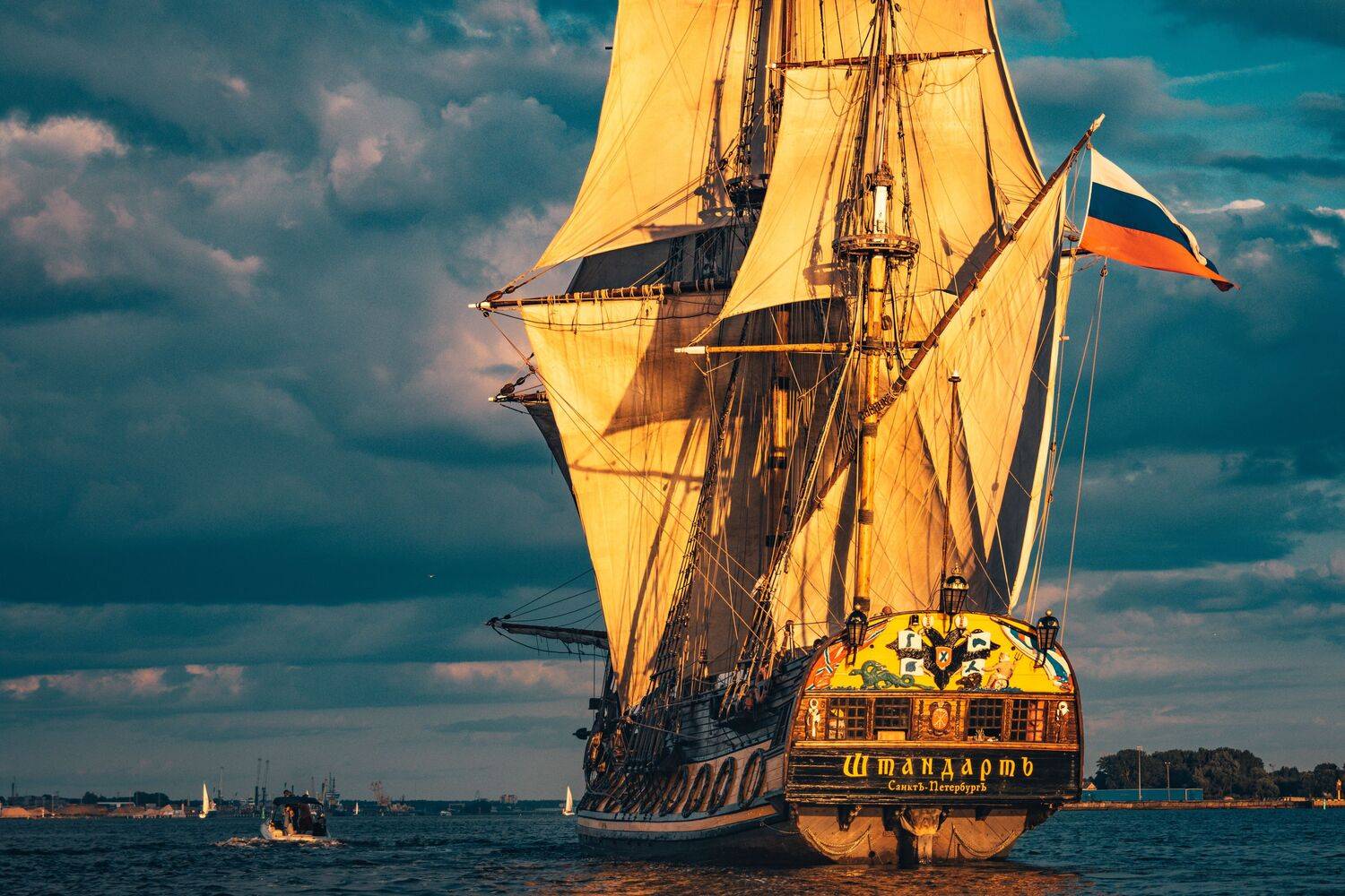 The Frigate Shtandar in calm weather sailing sunset time Riga Latvia ...
